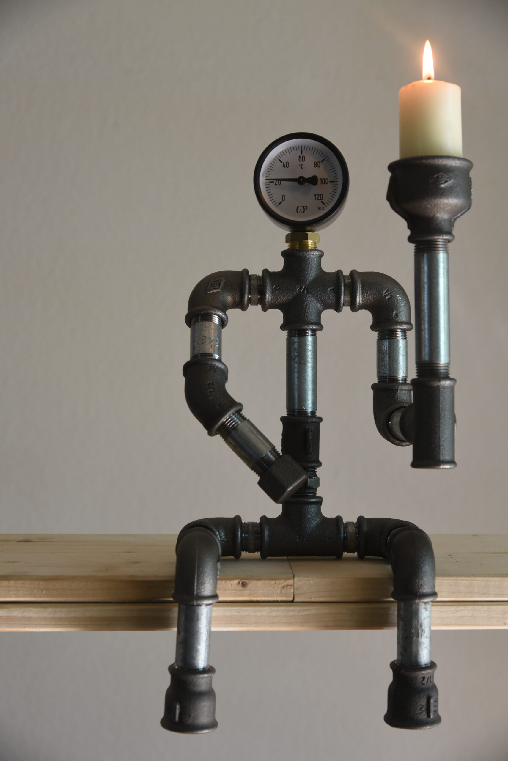 Temperman als Kantensitzer mit Kerze - art_temperi